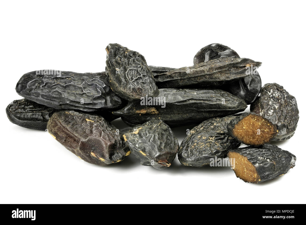 tonka beans isolated on white background Stock Photo - Alamy