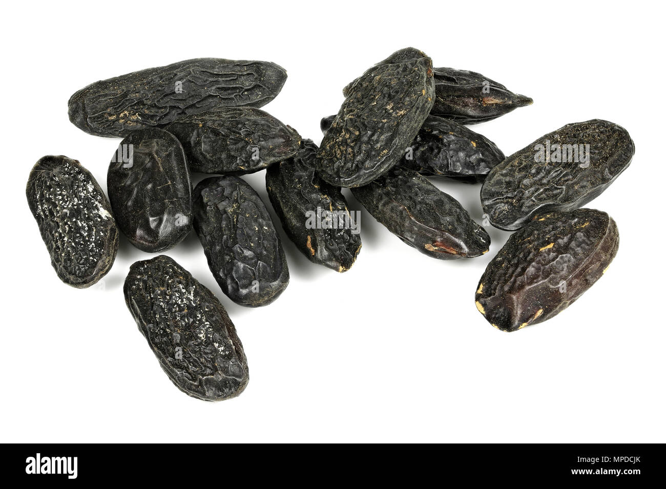 tonka beans isolated on white background Stock Photo - Alamy