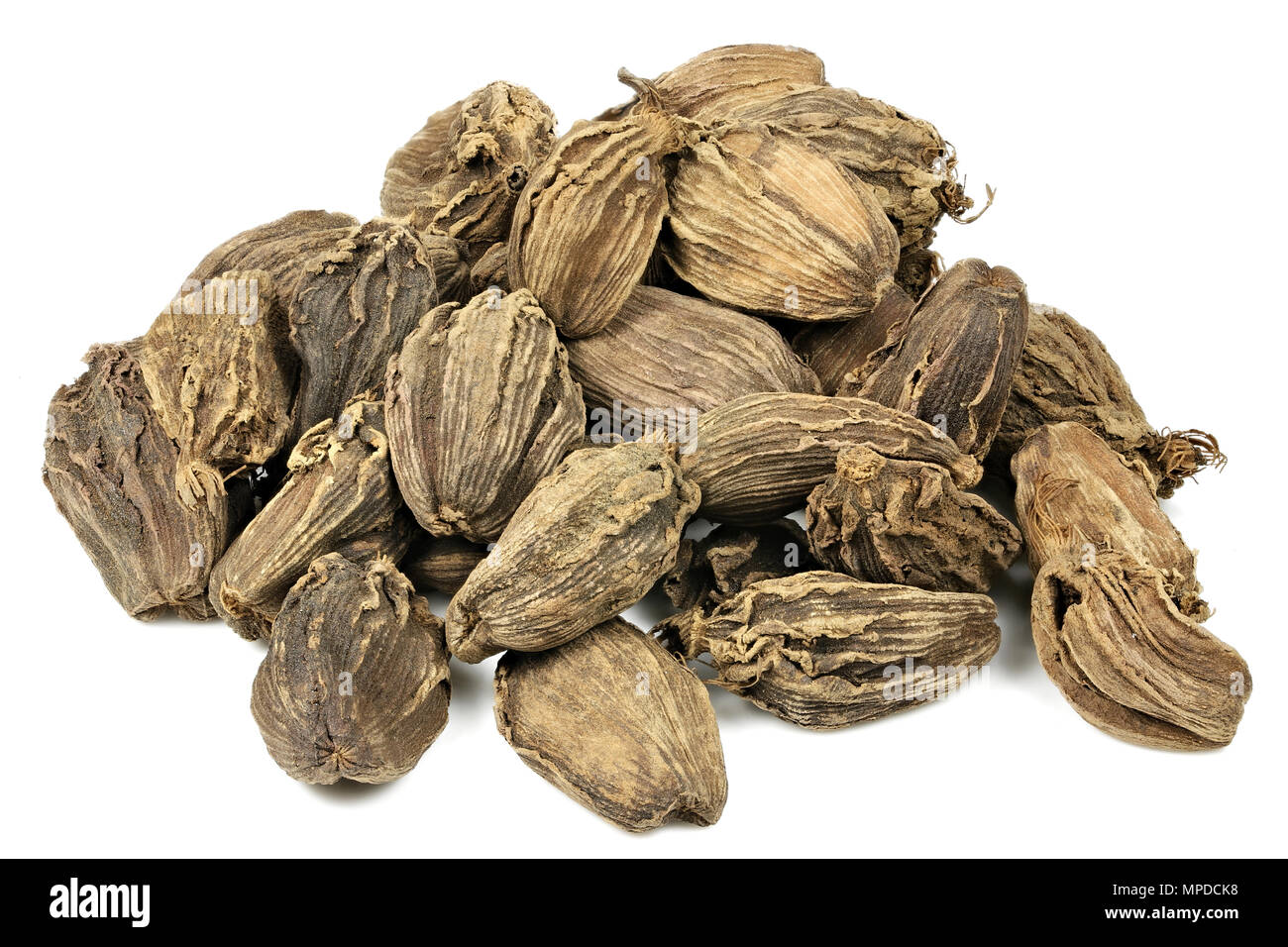 black cardamom isolated on white background Stock Photo - Alamy