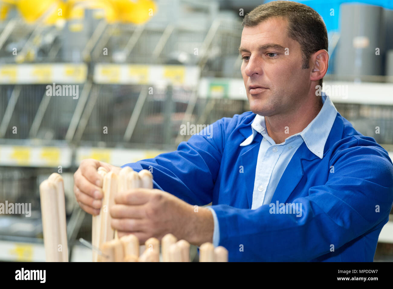portrait of caucasian hardware store salesman Stock Photo - Alamy