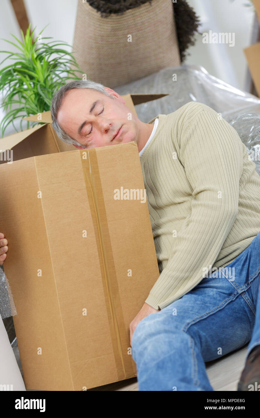 mature tired man on moving Stock Photo - Alamy