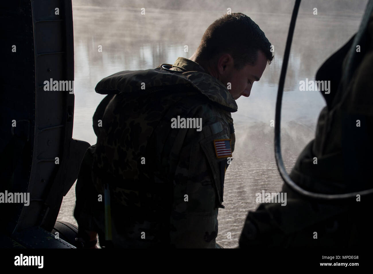 U.S. Army 1st Lt. Jonathan Reimer, 1st Armored Division, jumps from a ...