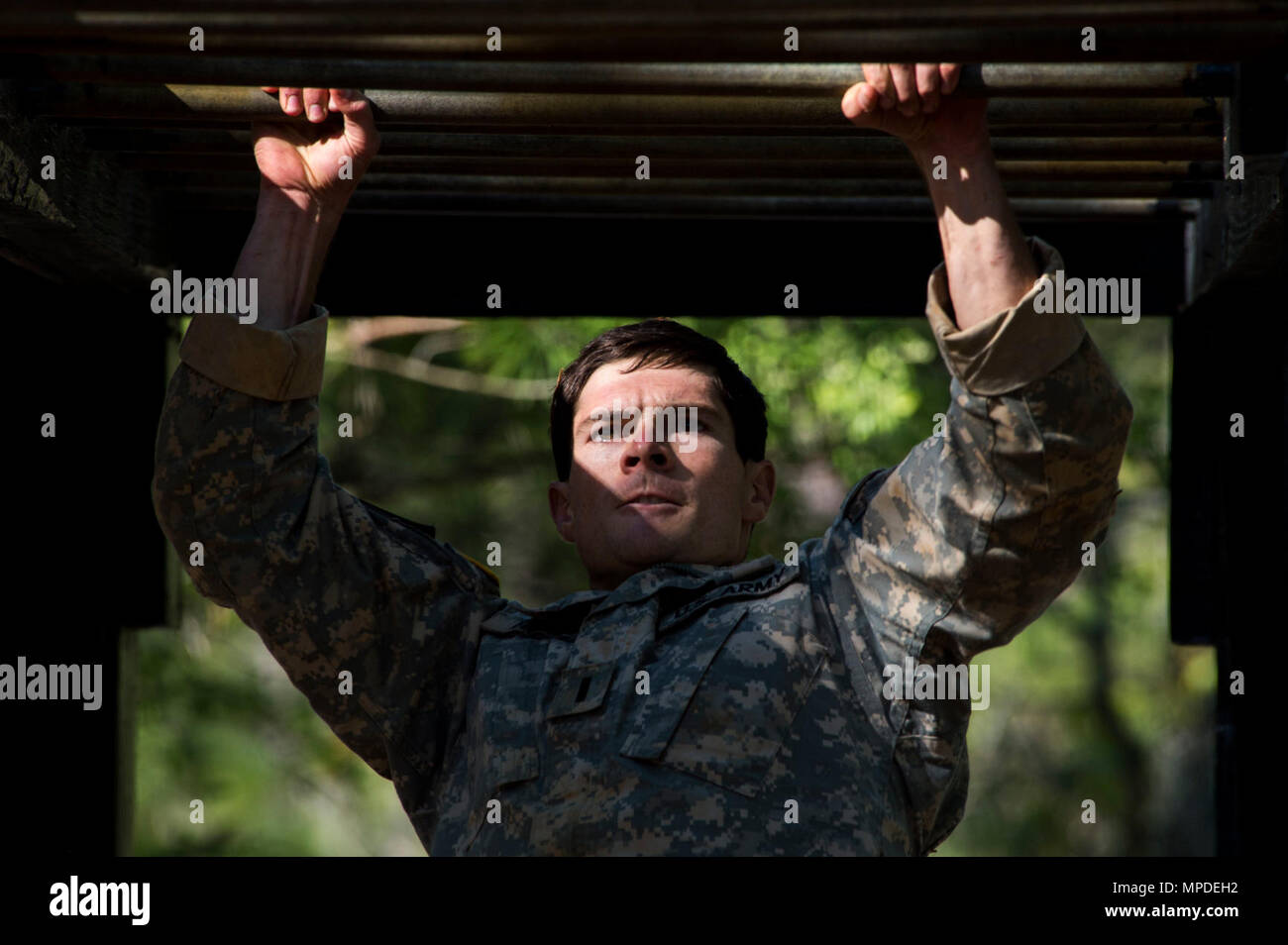 A U.S. Army Ranger traverses an obstacle at the Darby Queen obstacle ...