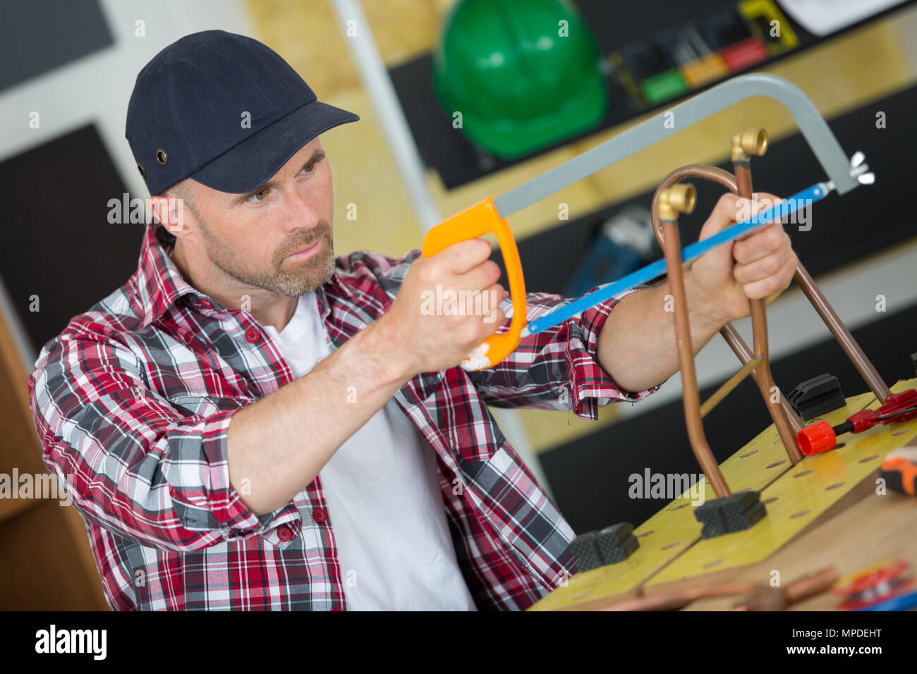 Male cuts pipe hi-res stock photography and images - Alamy