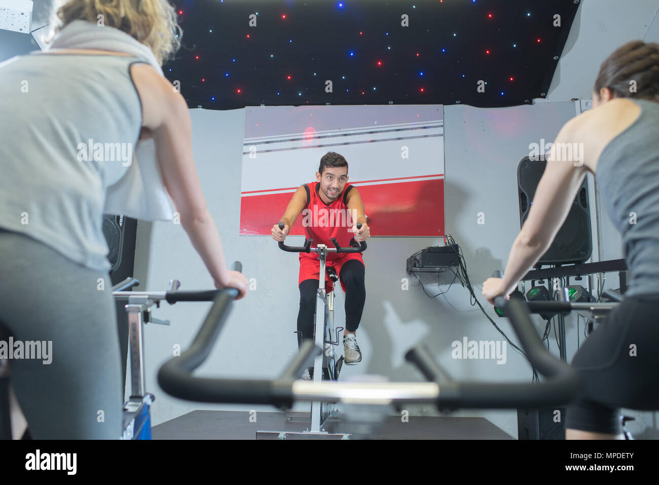 Spinning class in fitness studio hi-res stock photography and images ...