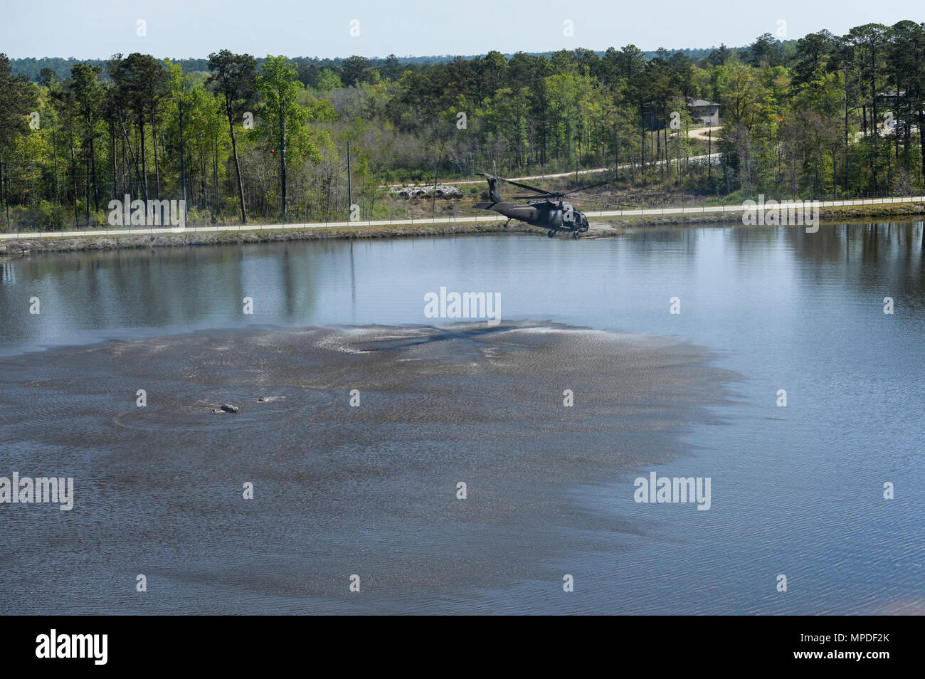 U.S. Army Rangers swim towards the designated completion point after ...