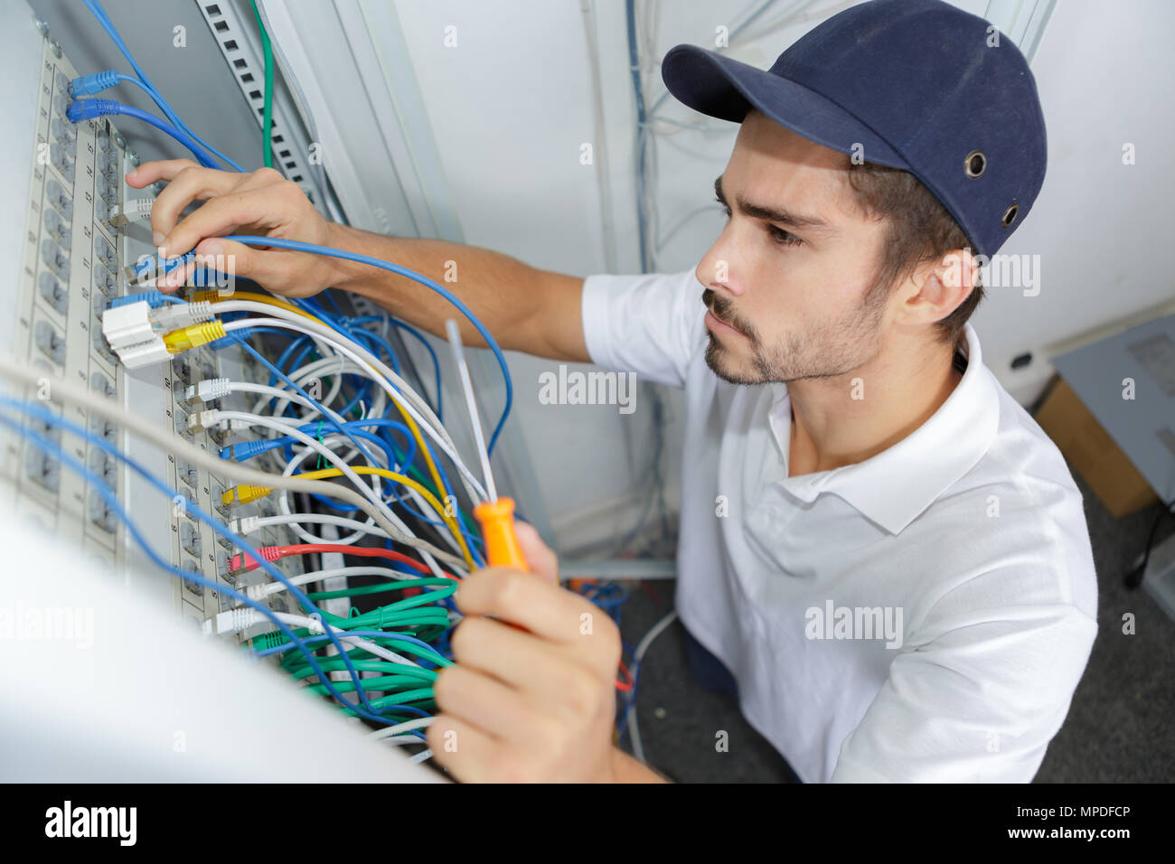 electrician wiring electrical panel Stock Photo - Alamy