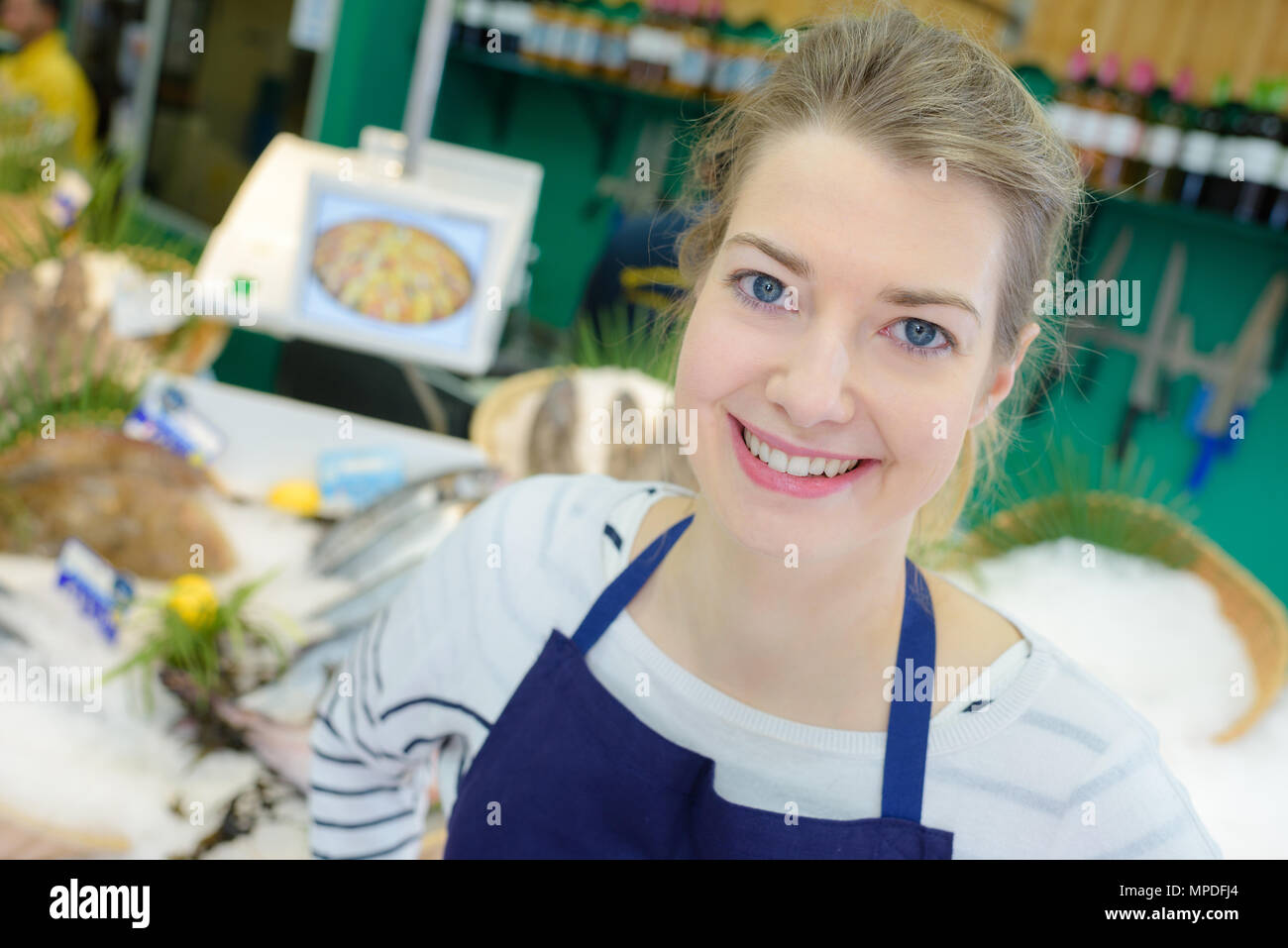 Female fishmonger hi-res stock photography and images - Alamy