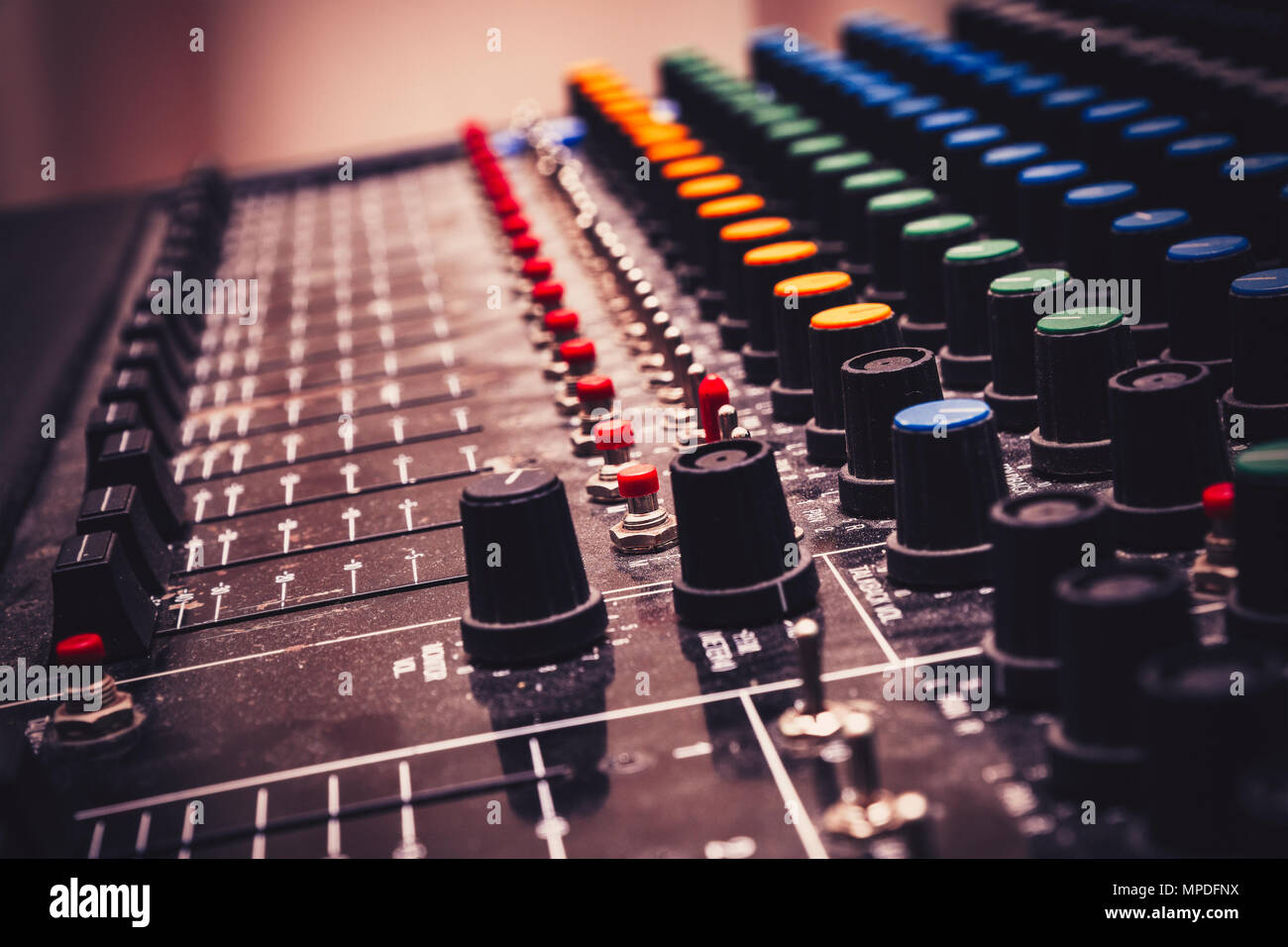 Old analog mixing console. Faders, buttons and sliders Stock Photo - Alamy
