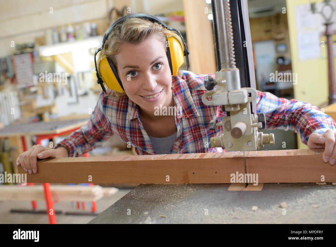 Female carpenter in uniform hi-res stock photography and images - Alamy