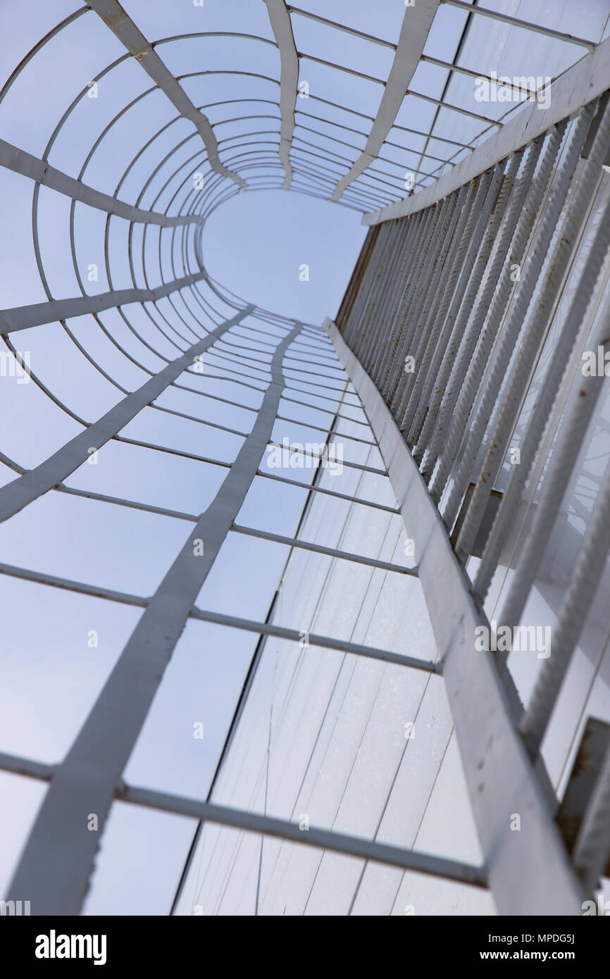 Outdoor fire escape on wall of building in perspective Stock Photo - Alamy