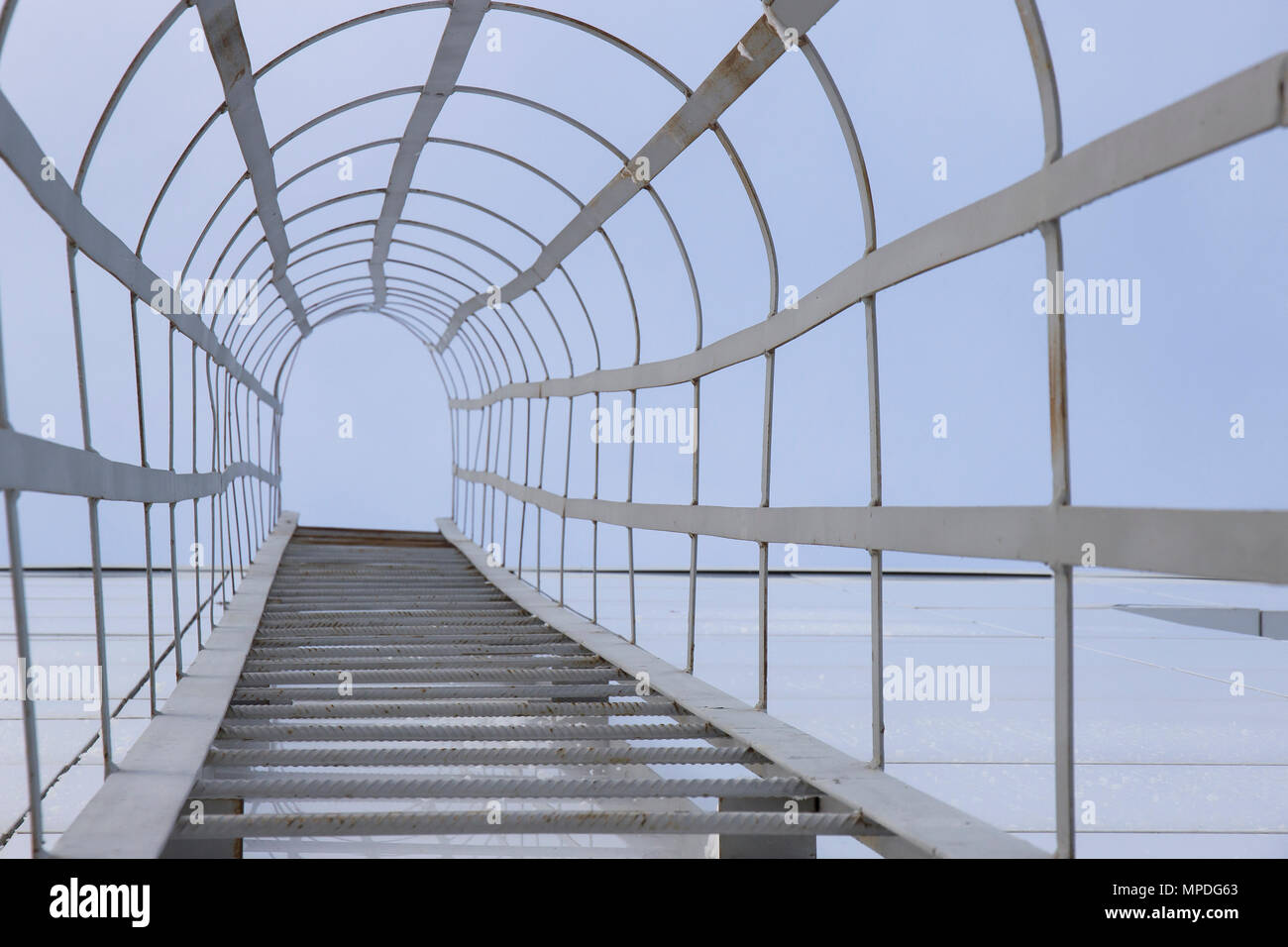Fire escape leading to roof view from below Stock Photo - Alamy