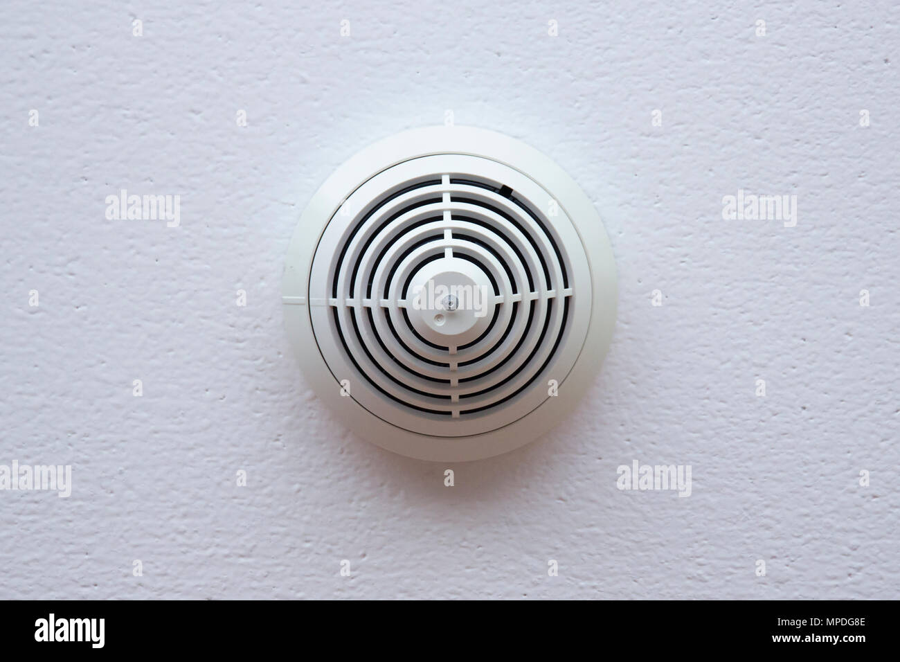 Fire alarm smoke detector on celling Stock Photo - Alamy