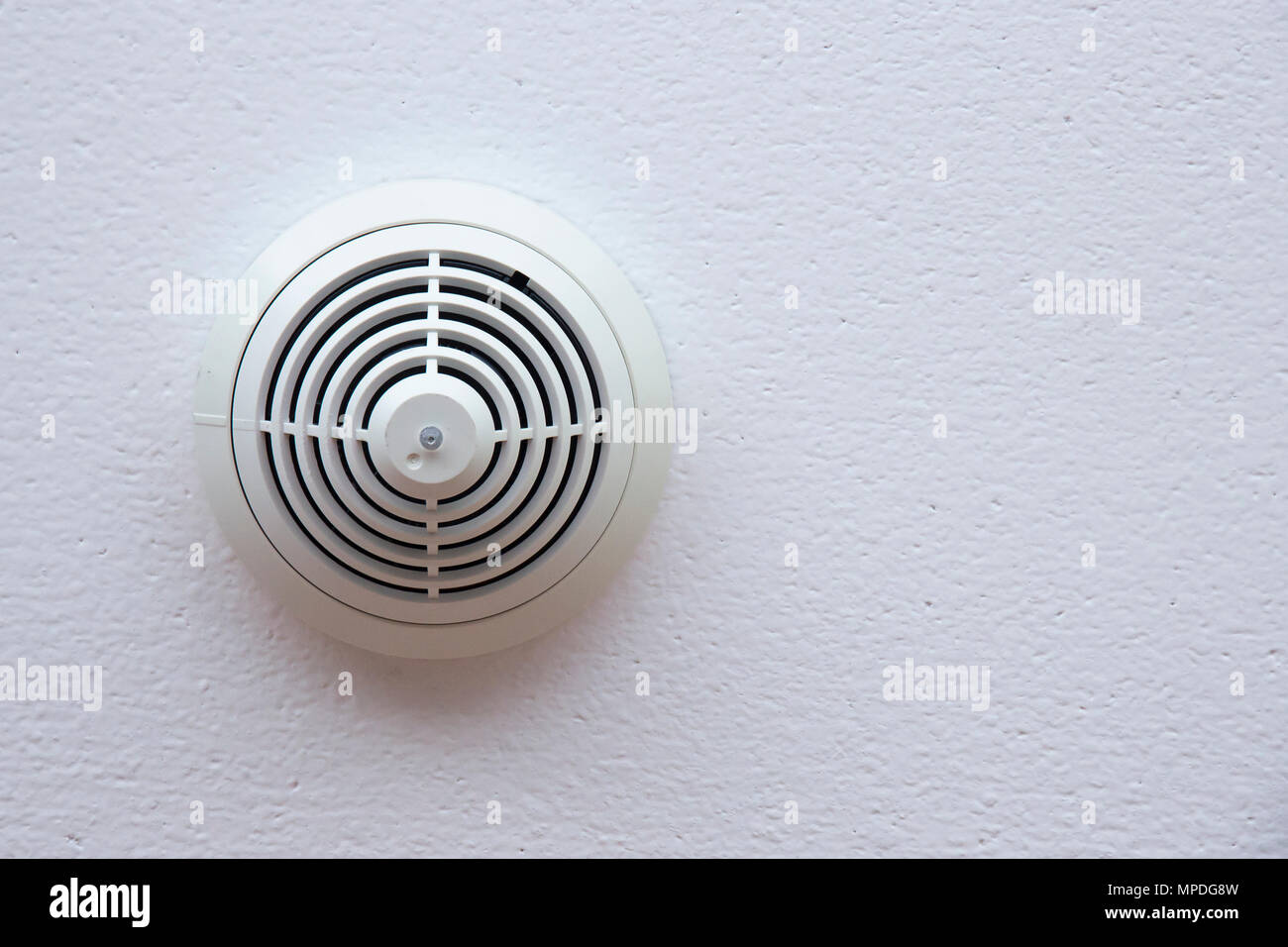 Smoke detector fire alarm on celling Stock Photo - Alamy