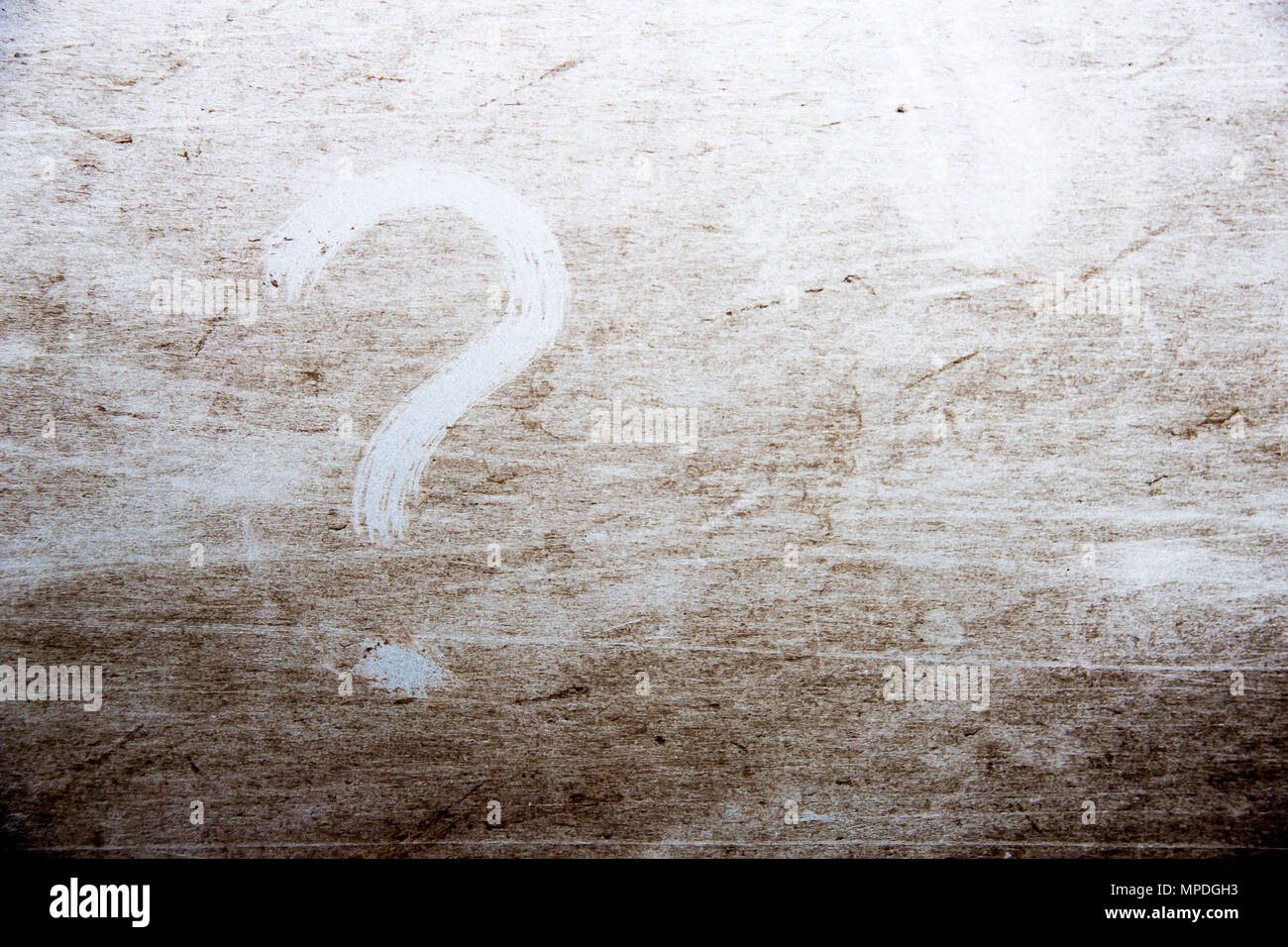 question mark is drawn on scratched dirty background Stock Photo - Alamy