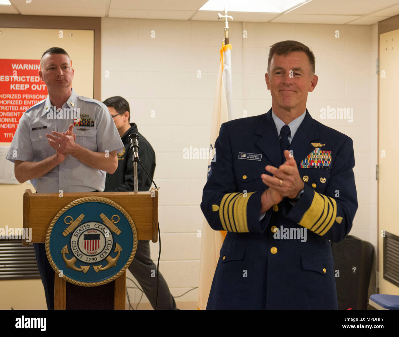 Adm. Paul F. Zukunft, commandant of the U.S. Coast Guard, applauds ...