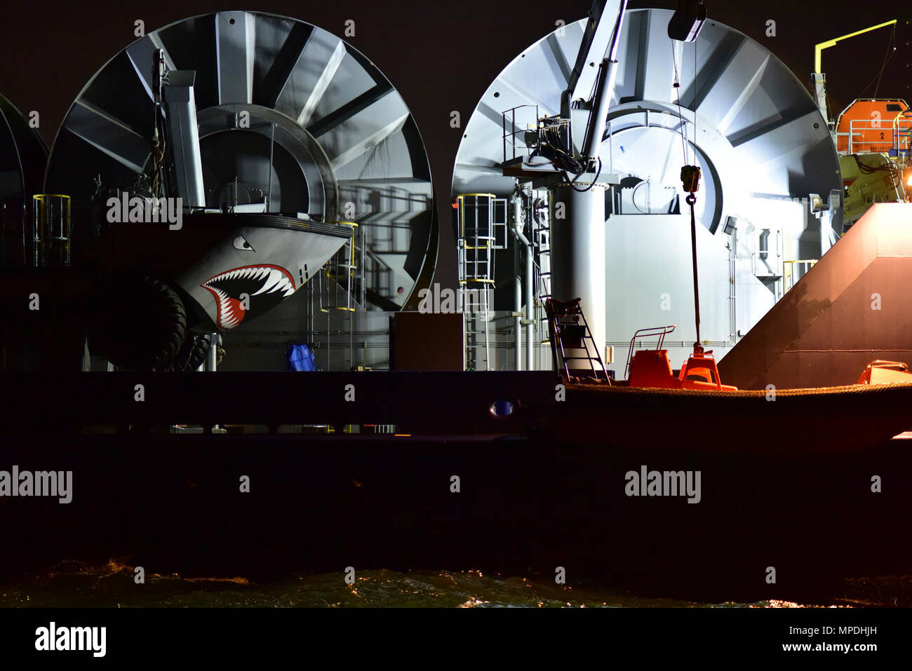 A lighter amphibious resupply cargo vehicle, or LARC, is cradled aboard ...