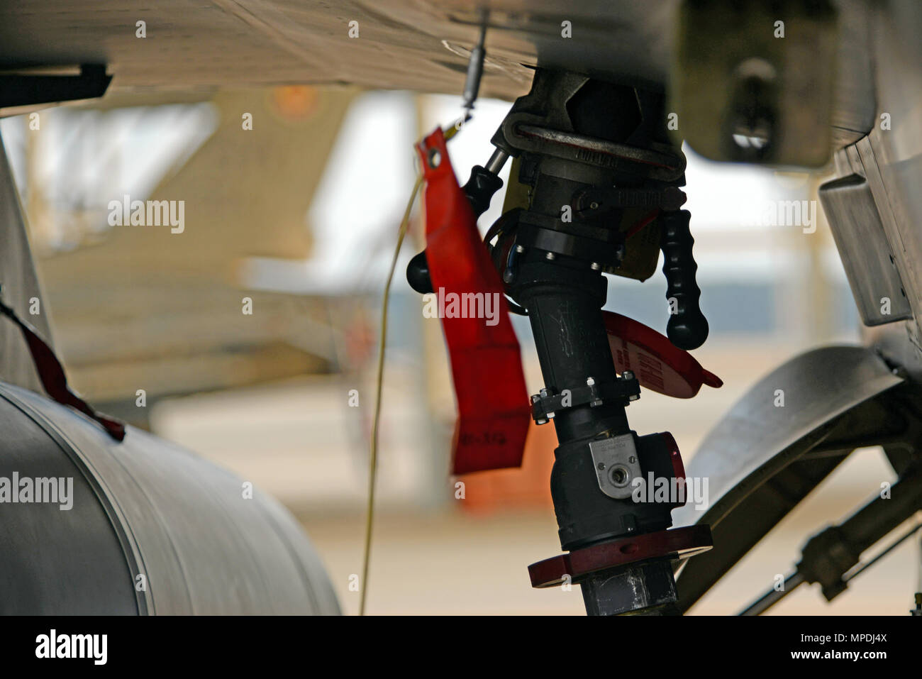 A fuel nozzle from an R-11 refueling truck delivers Jet A fuel to an F ...