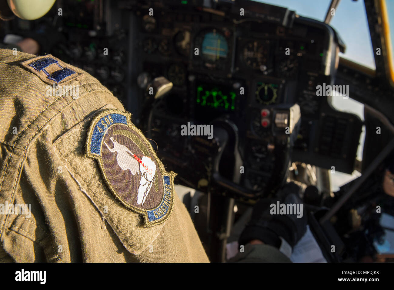 A U.S. Air Force pilot from the 4th Special Operations Squadron flies ...