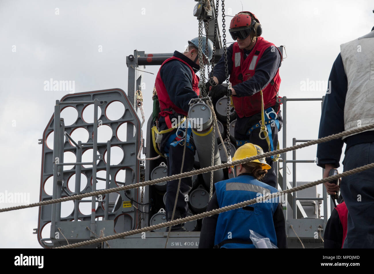 170303-N-XK809-143 PHILIPPINE SEA (March 3, 2017) Sailors load ordnance ...