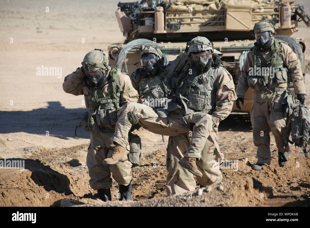 U.S. Soldiers, assigned to the 2nd Brigade, 1st Cavalry Division, carry ...