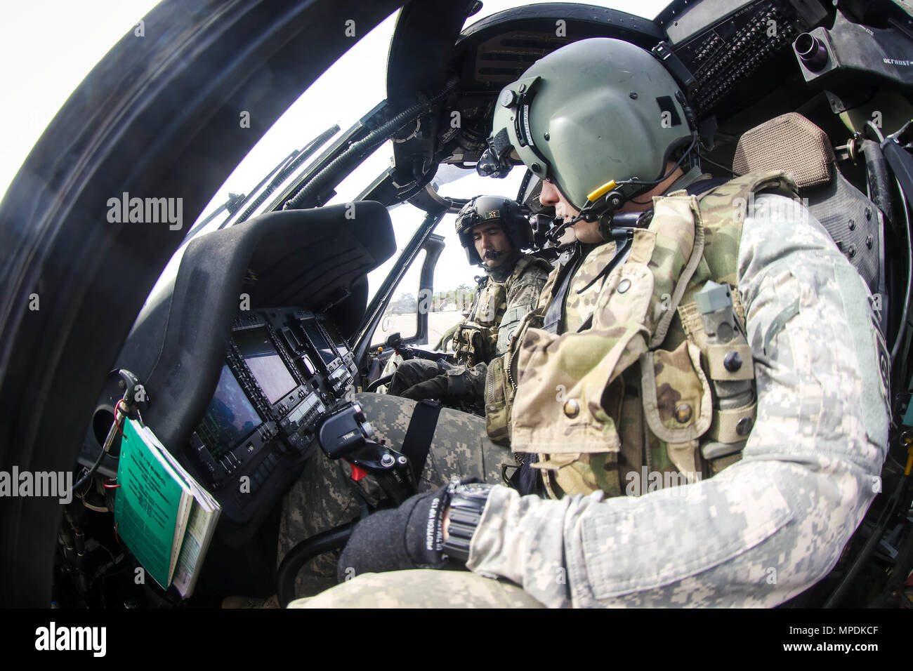 Two pilots from 2nd Assault Helicopter Battalion, 82nd Combat Aviation ...