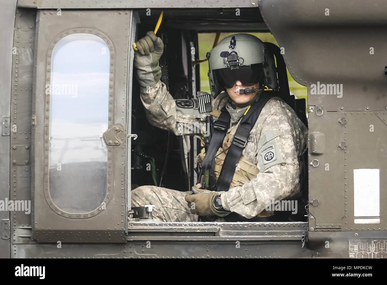 A crew chief with 2nd Assault Helicopter Battalion, 82nd Combat ...
