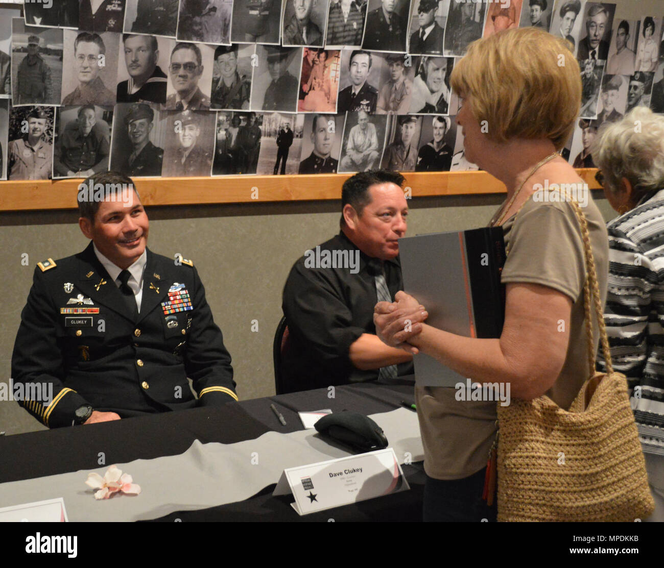Lt. Col. Dave Clukey, commander, Phoenix Recruiting Battalion, talks with a member of the ...