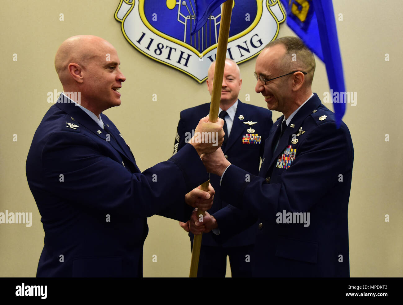 Lt. Col. John commander of the 246th Intelligence Squadron, passes the ...
