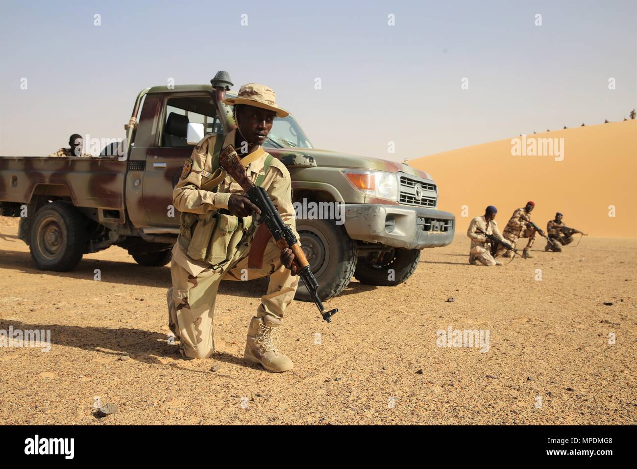 A Chadian Army Soldier pull security during a simulated assault in Faya ...