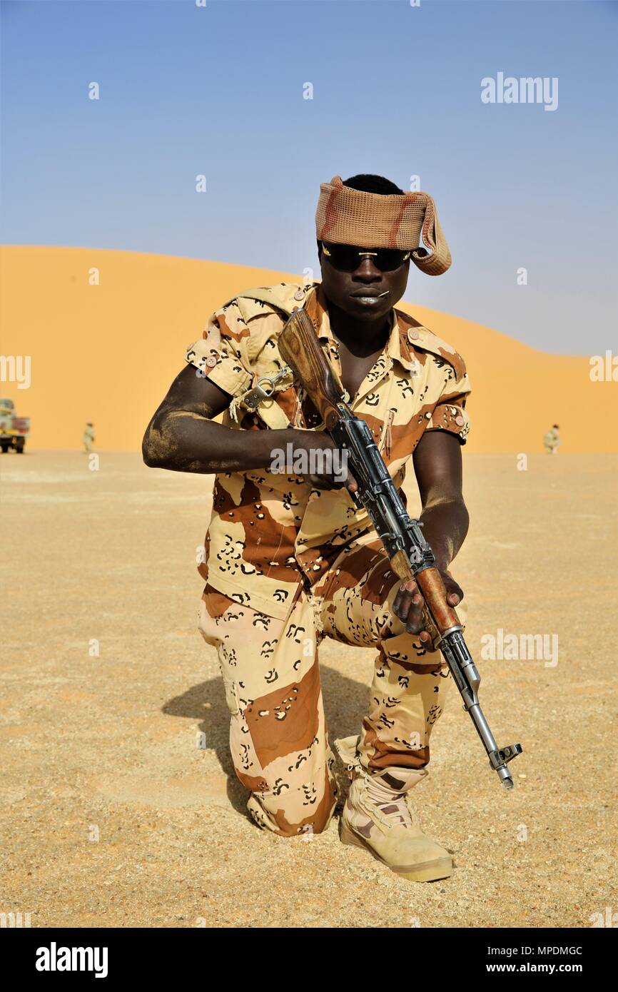 A Chadian Army Soldier pull security during a simulated assault in Faya ...