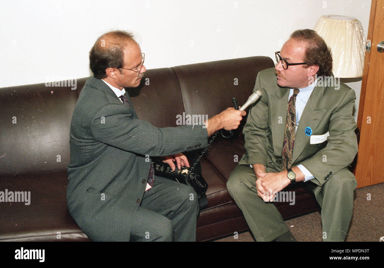 MAN GIVING INTERVIEW Stock Photo - Alamy