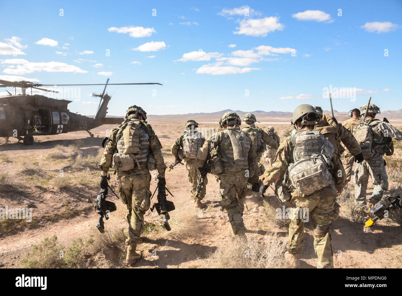 U.S. Soldiers with the 11th Armored Cavalry Regiment evacuate a role ...