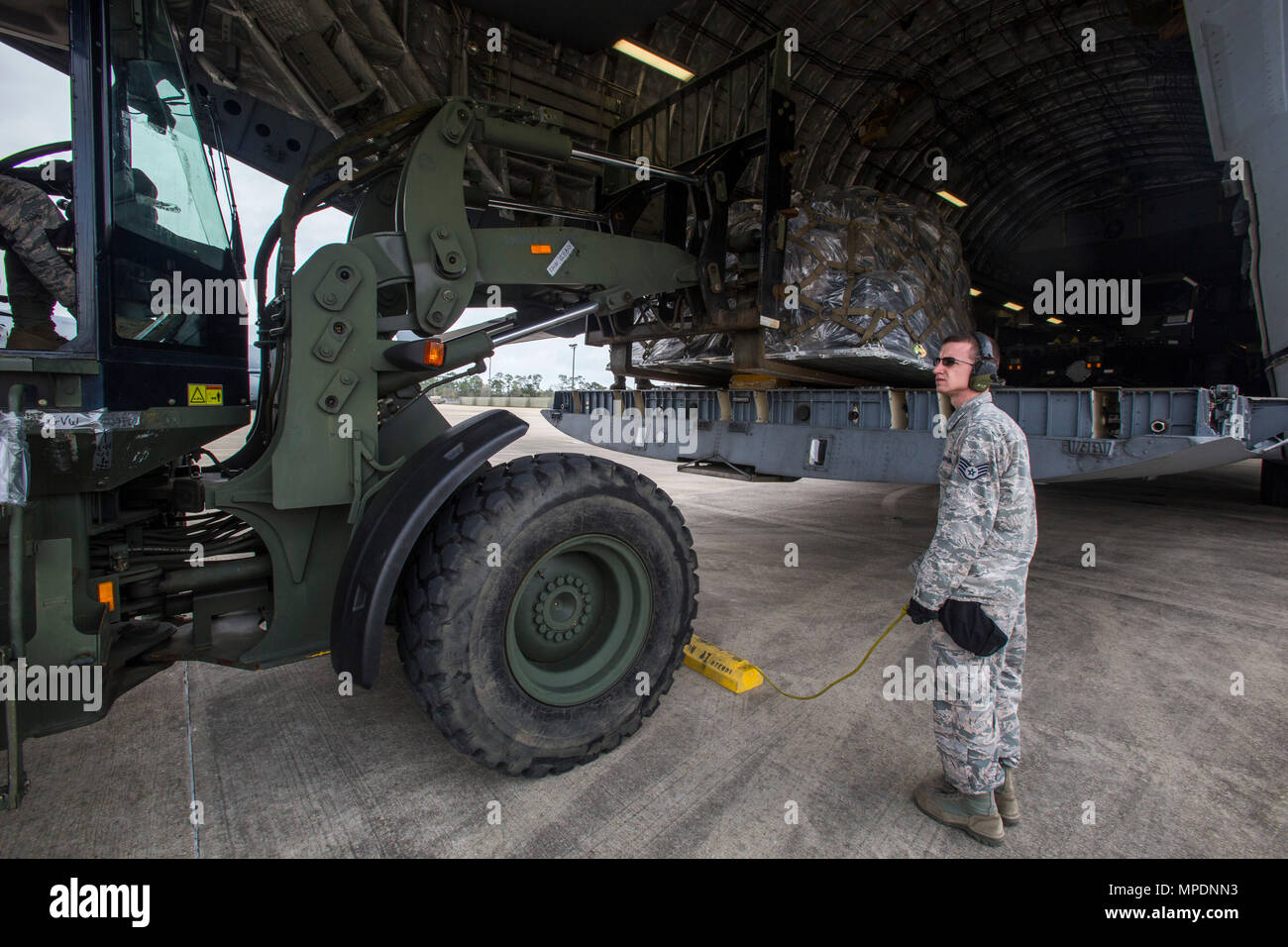 An aerial porter with the 35th Aerial Port Squadron, 514th Air Mobility ...