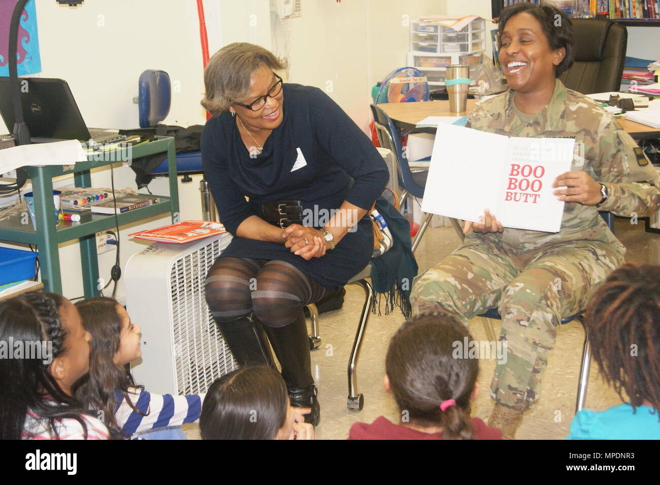 (Left to right) 80th Training Command soldiers Mrs. Brenda Dabney and ...