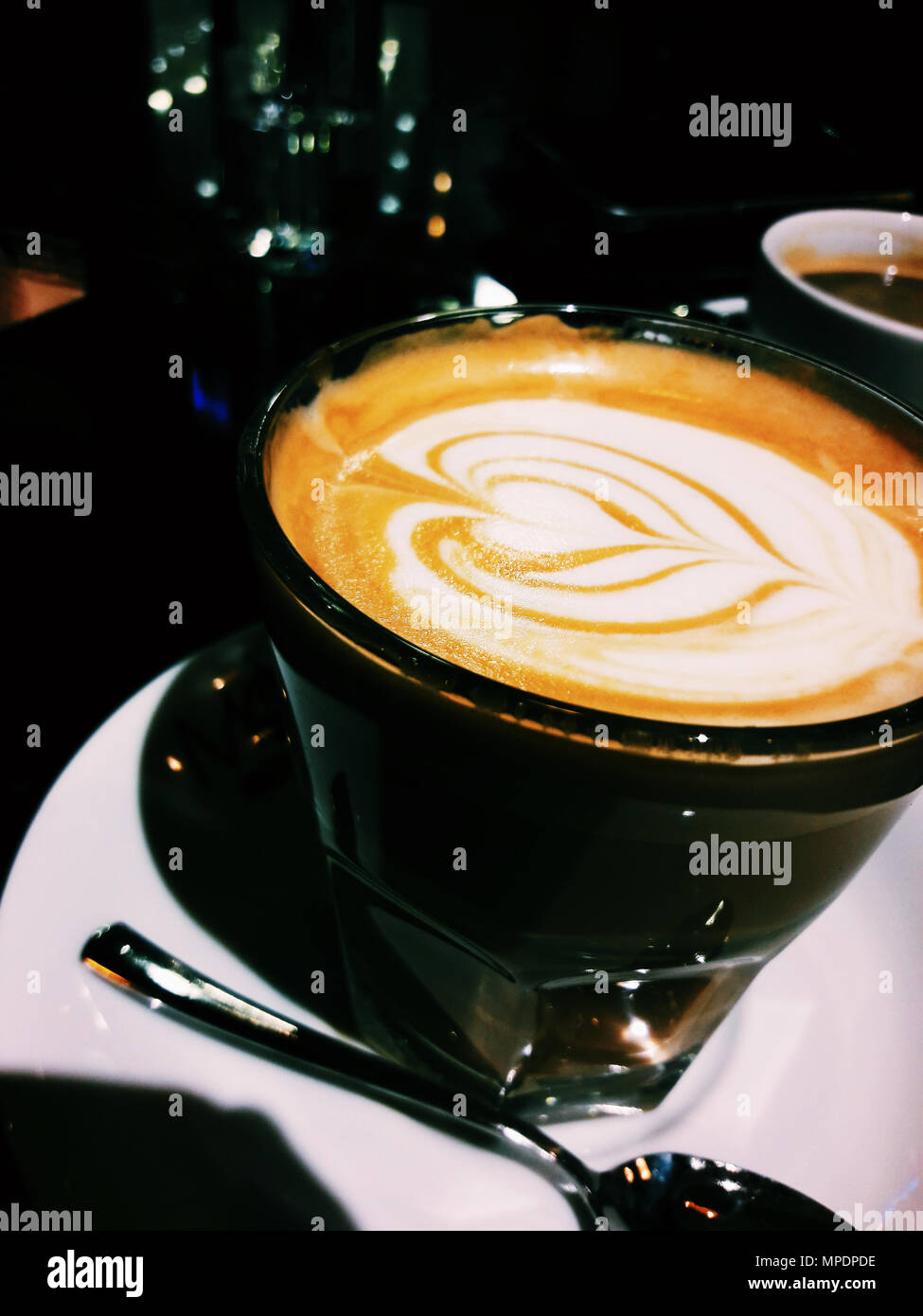 Glass of Latte at Coffee Shop. Beverage Concept Stock Photo - Alamy