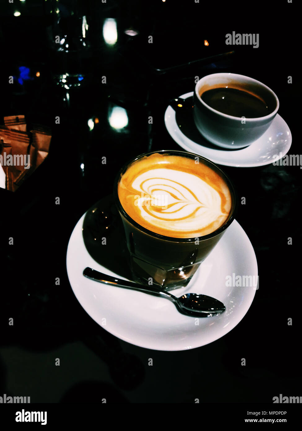 Glass of Latte at Coffee Shop. Beverage Concept Stock Photo - Alamy