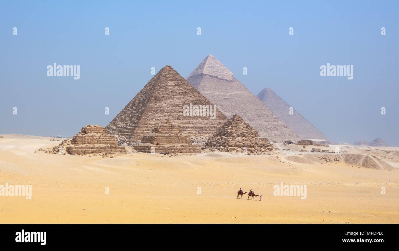 Tourists riding camels in egypt hi-res stock photography and images - Alamy