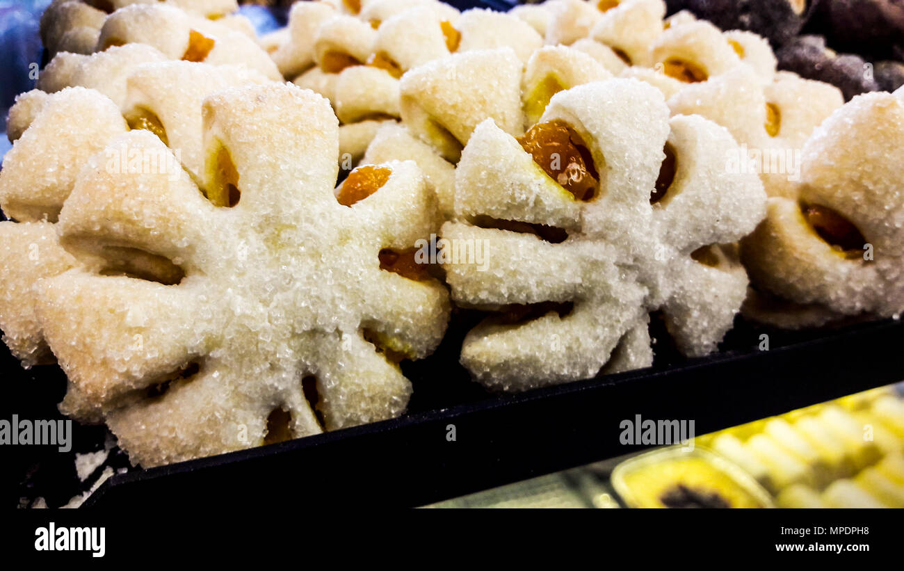 Cookies with sticky sugar and jam at patisserie showcase concept Stock ...