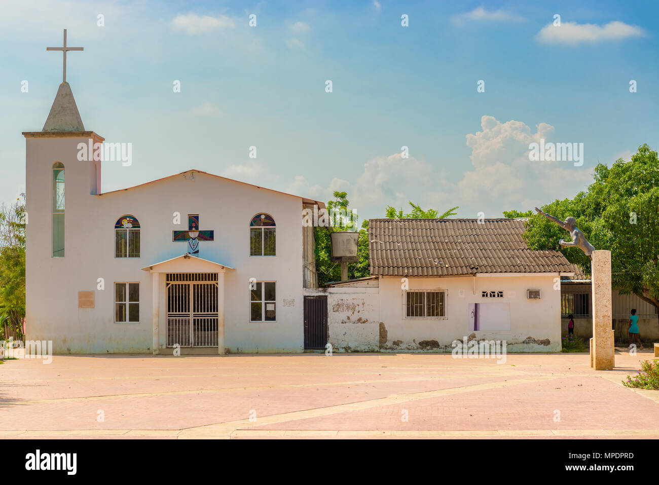 San Basilio de Palenque, Colombia - March 25, 2017: Church and monument ...