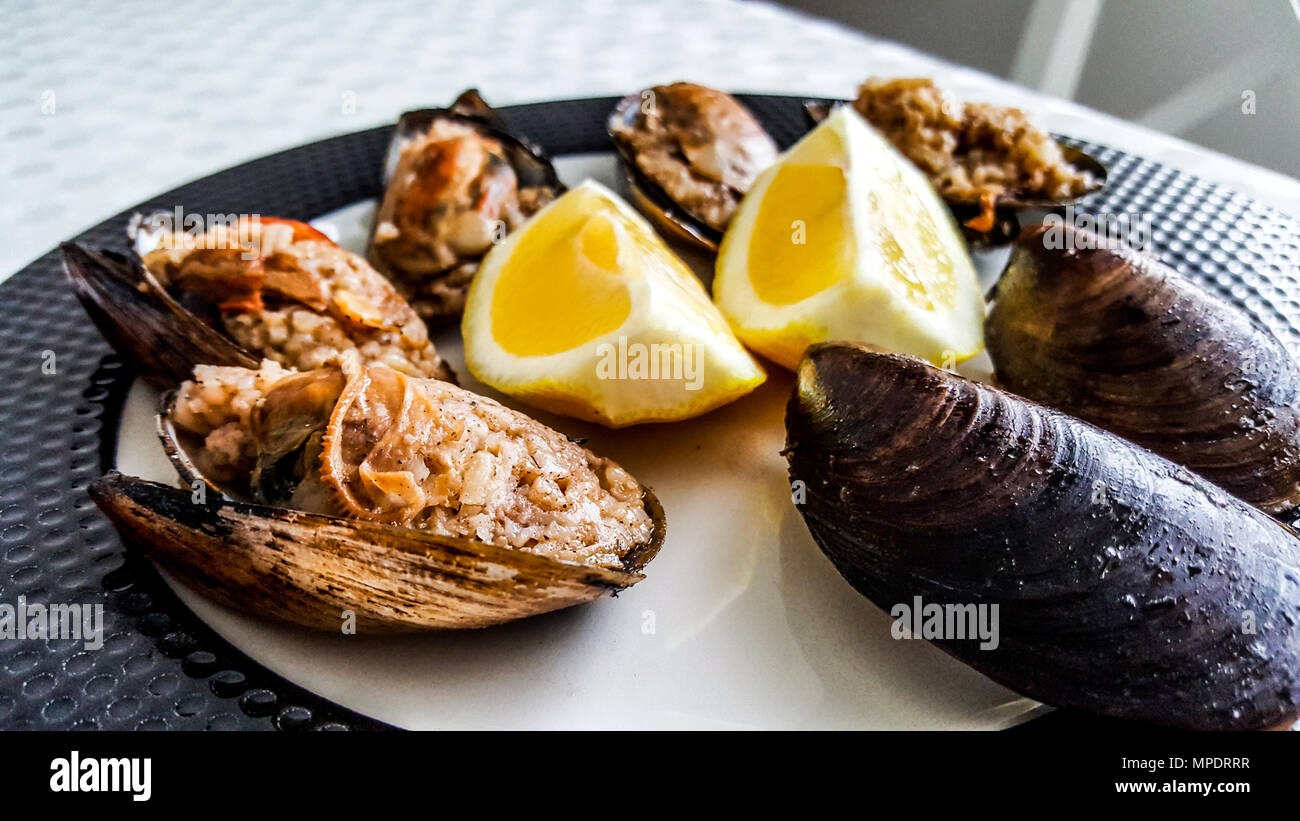 Turkish Stuffed Mussels with lemon / Midye Dolma. street food Stock ...