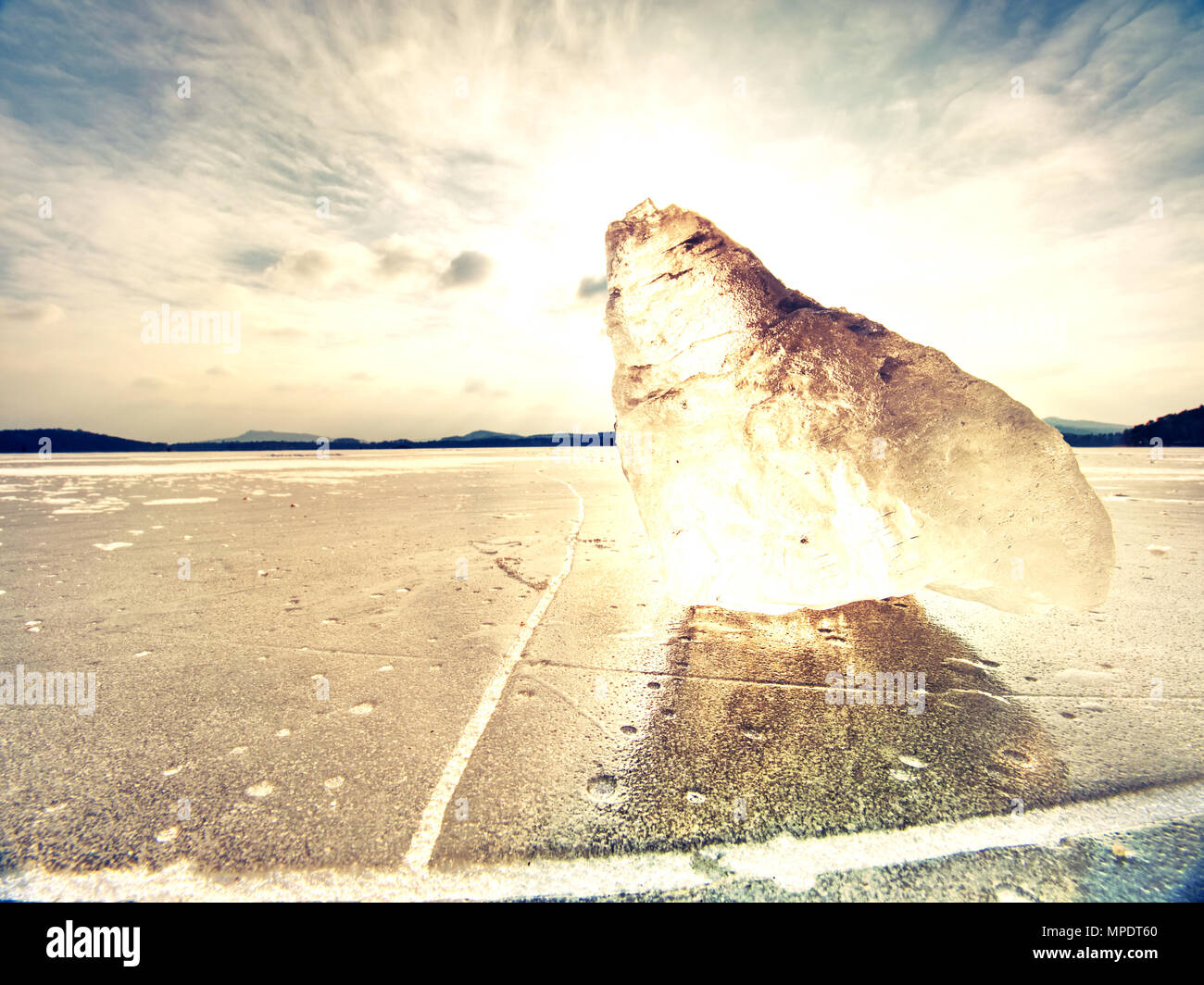 Abstract effect. Ice floe and crushed ice on dark frozen and flat ...