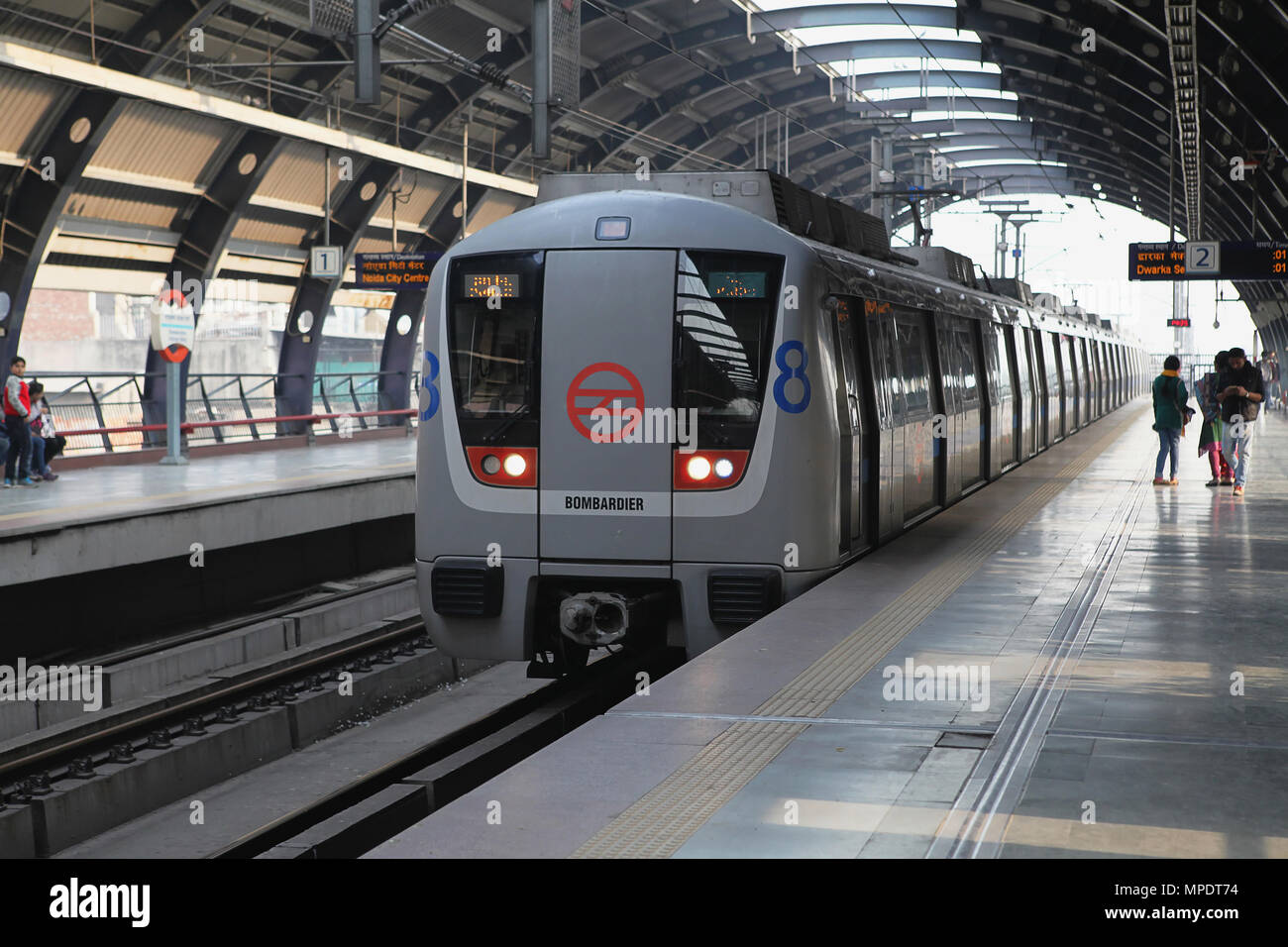 India, New Delhi, Metro train at Ramakrishna Ashram Marg metro station ...
