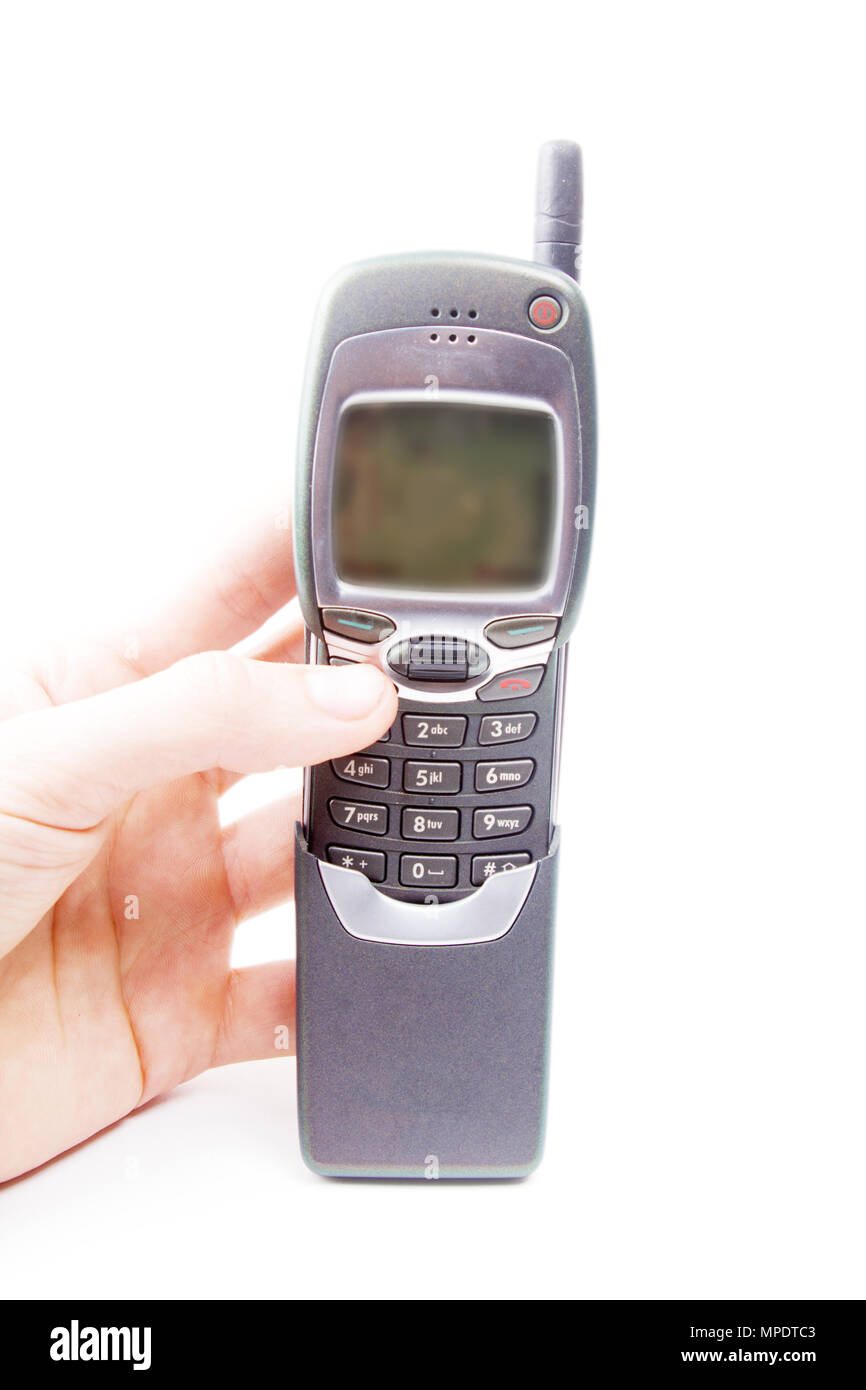 Old Mobile Phone. disposed obsolete phone on white background Stock ...