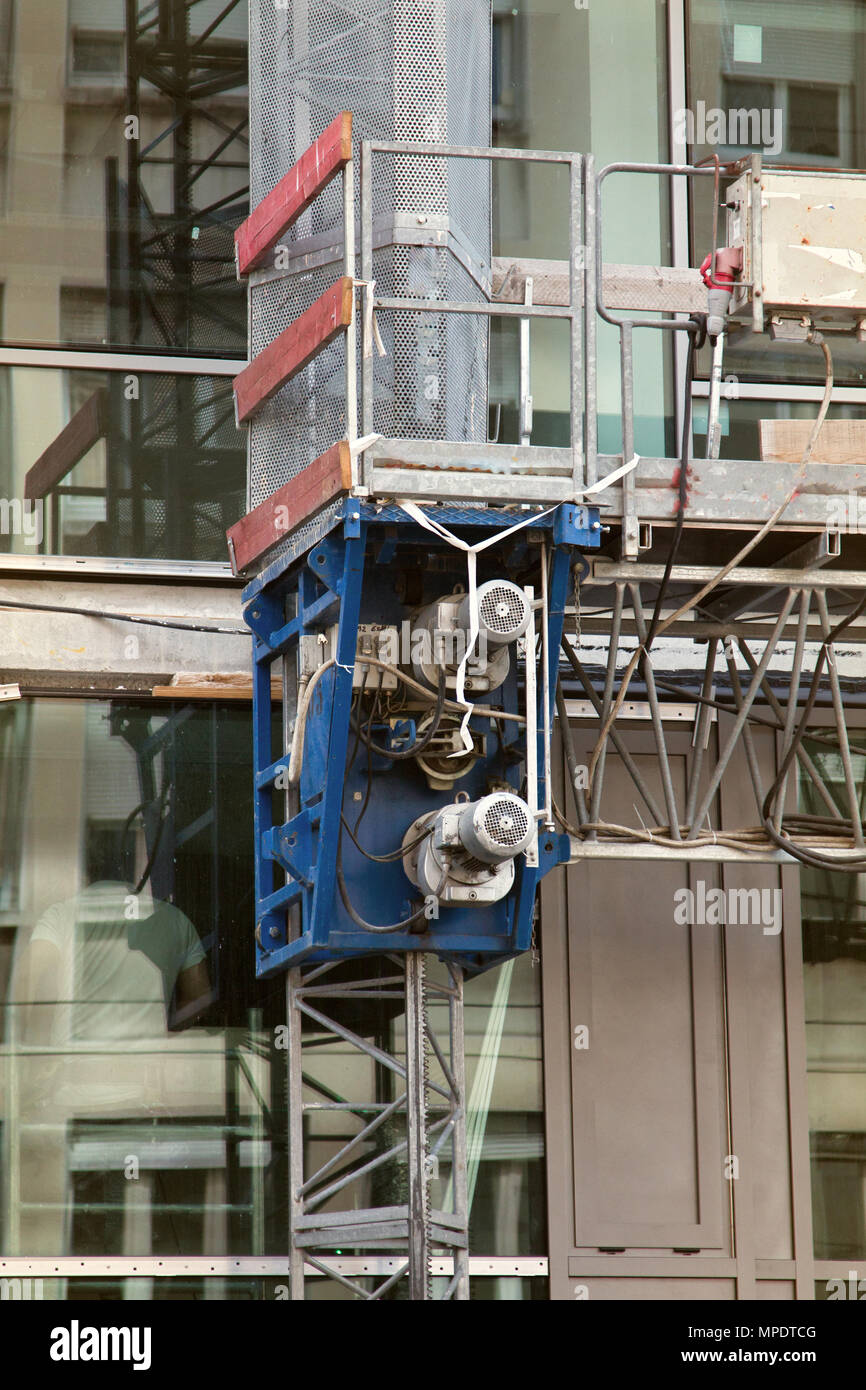 Building of glass and metal. Lift for window cleaners, lifting ...