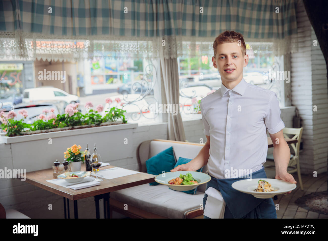 Formal meal restaurant waiter hi-res stock photography and images - Alamy