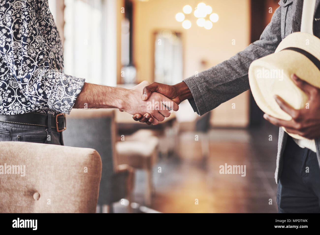 Team work hands black hi-res stock photography and images - Alamy