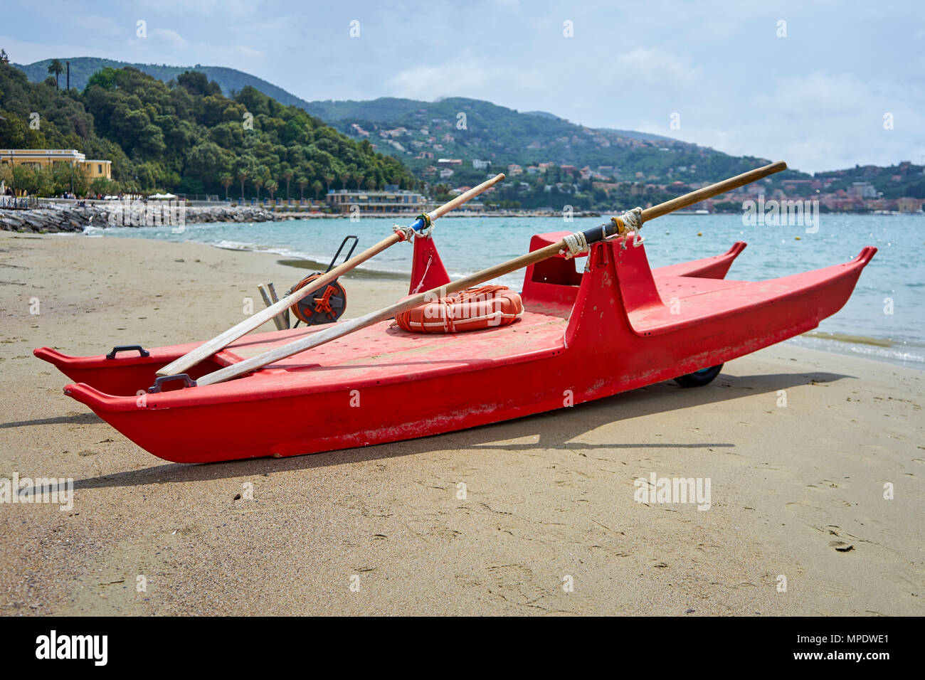 Red Italian Rescue Boat Stationed A The Beach Stock Photo - Alamy