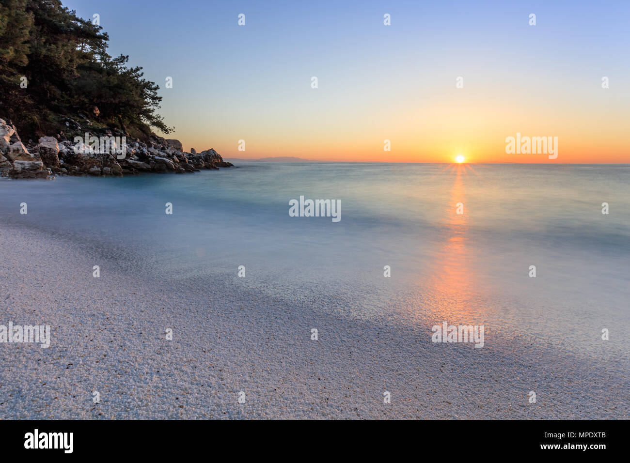 Sunrise in Marble beach (Saliara beach), Thassos Islands, Greece. The ...
