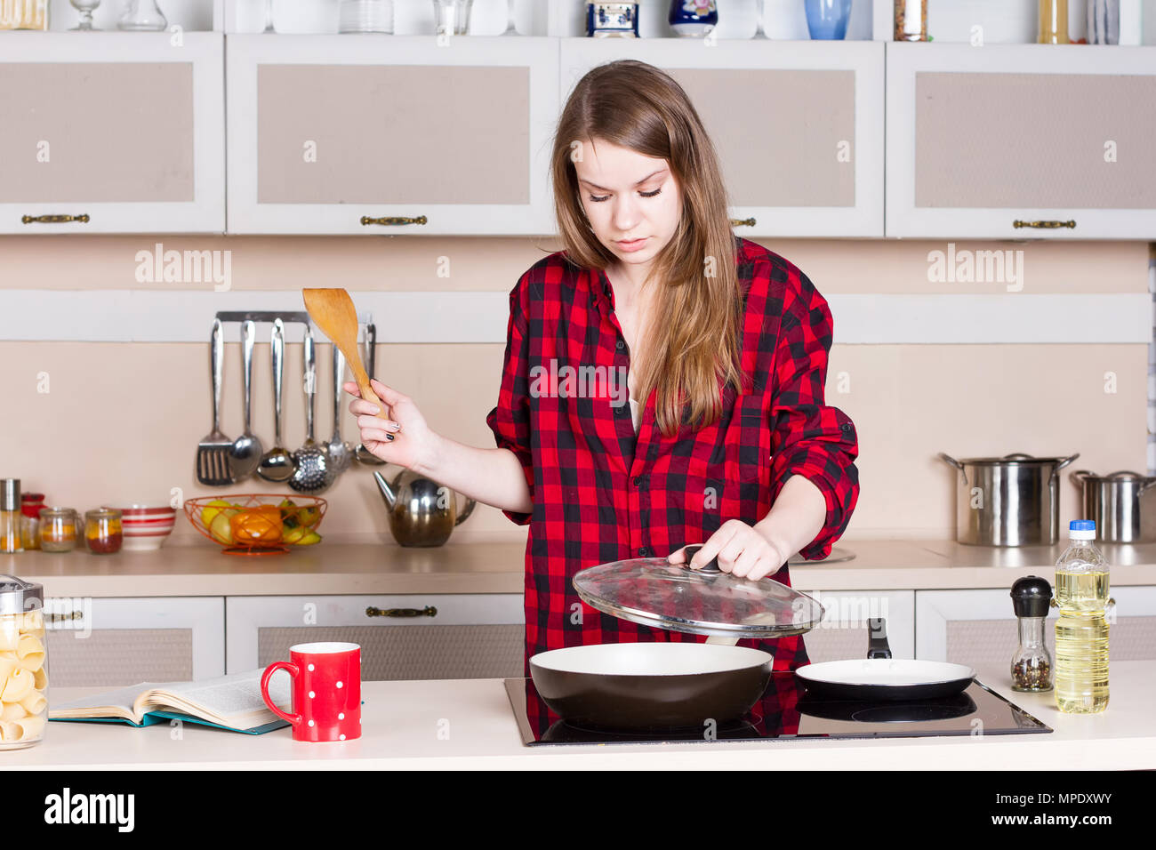 Girl with red shirt hi-res stock photography and images - Alamy